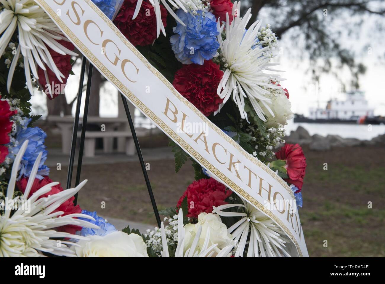 A wreath sits at the Coast Guard Cutter Blackthorn memorial before the ...