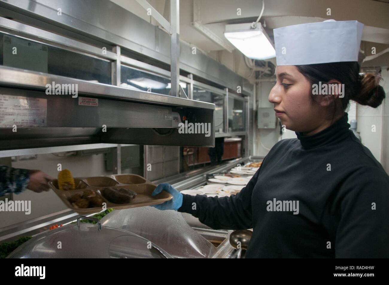 Culinary Specialist Seaman from Santa Rosa, California, serves lunch in ...