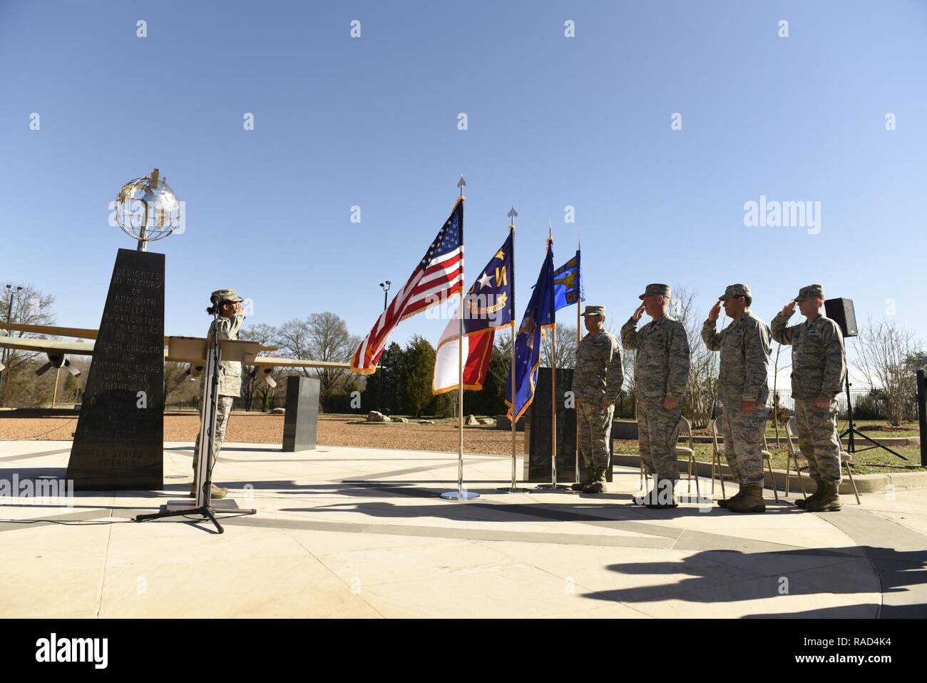 Airmen of the 145th Airlift Wing salute the American flag during a ...
