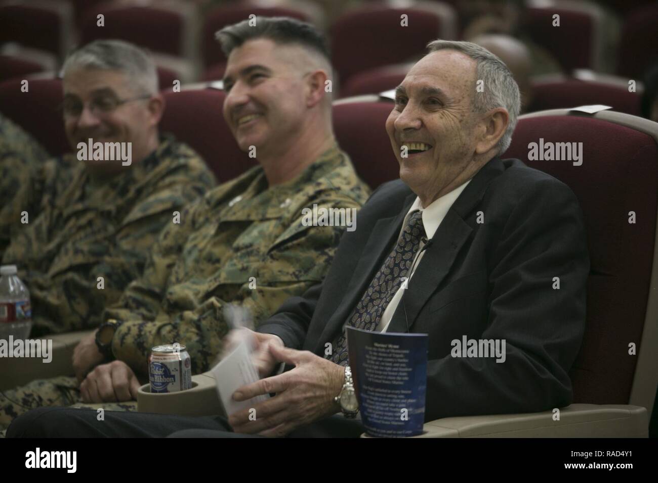 U.S. Marine Corps Lt. Col. Frederick Grant listens to remarks from a ...