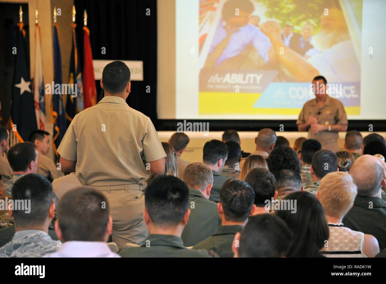 A U.S. Navy FAO poses a question to keynote speaker, Rear Adm. Todd ...