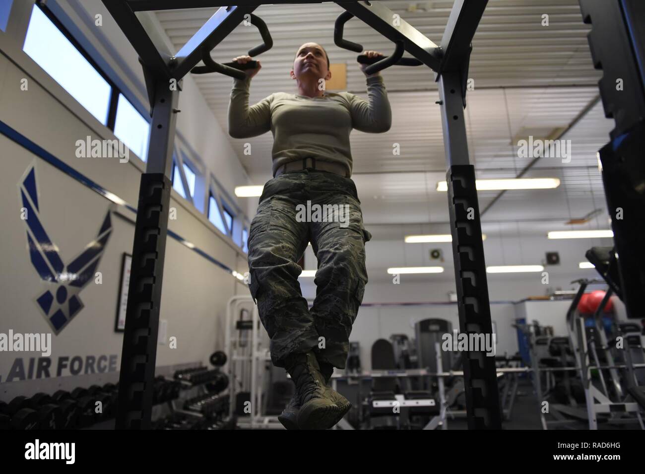 TSgt Brandy Foster, 422nd Communications Squadron, does a pull up at ...