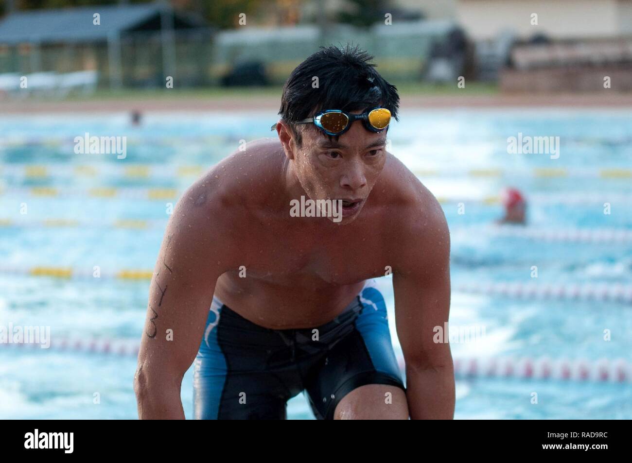 SCHOFIELD BARRACKS — David Hsu competes in the 400-meter swim portion ...