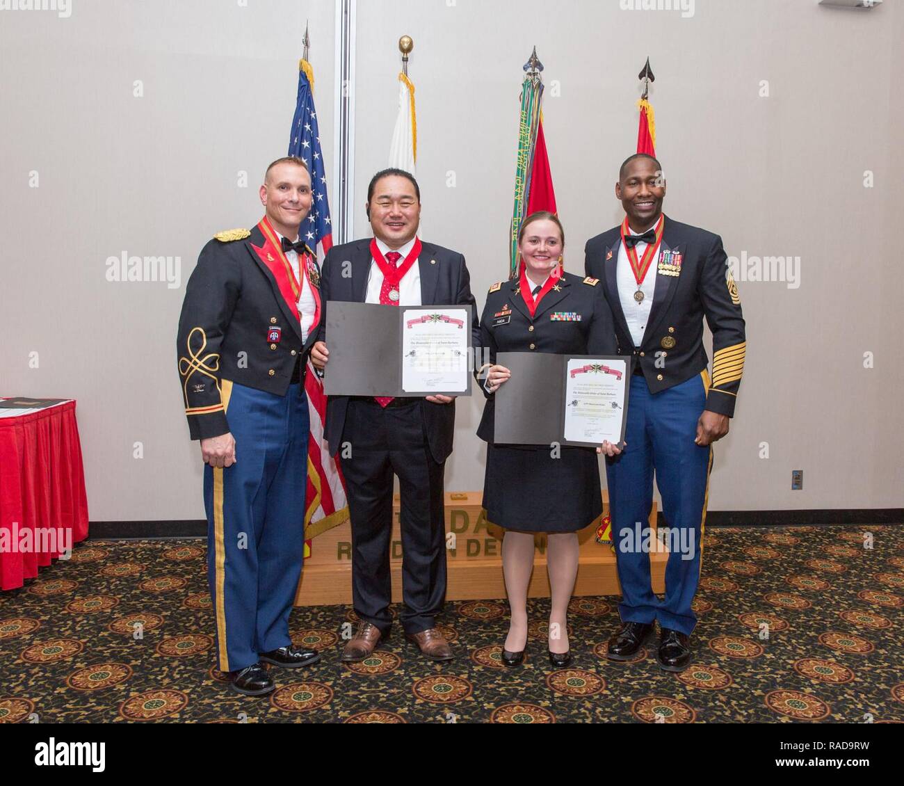 Capt. Maegan Hada, HHB commander, 35th ADA Brigade, poses with Kim Jin ...