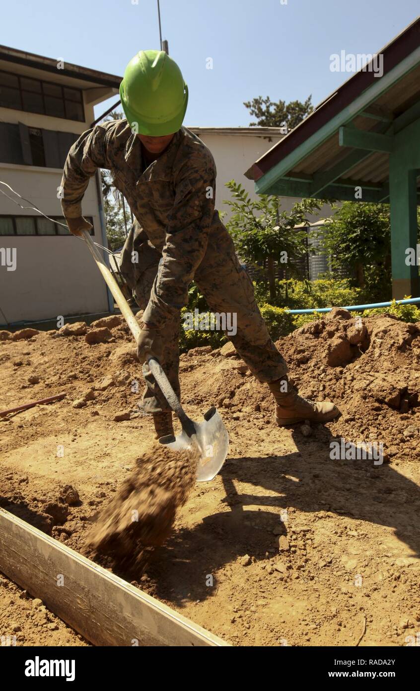 U.S. Marine Corps Lance Cpl. Jeffery Wade, a Combat Engineer, with ...