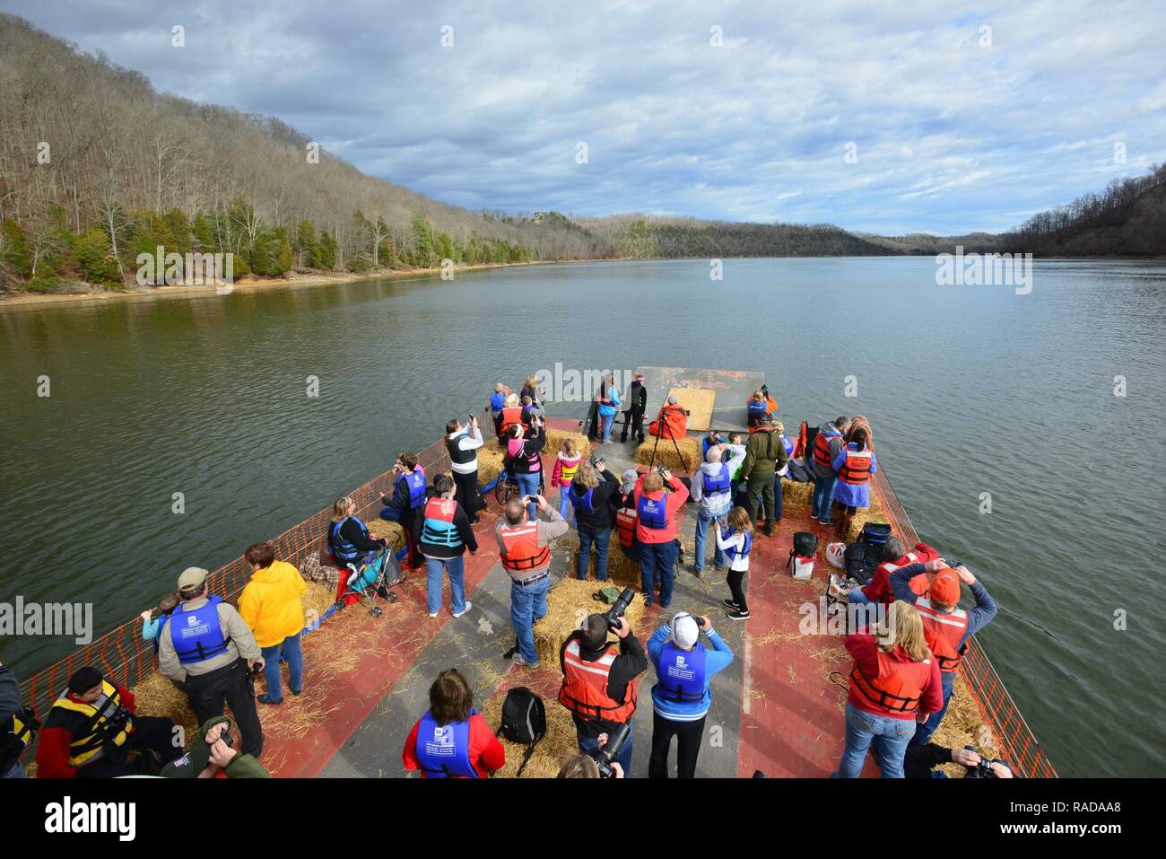 Eager sightseers boarded a U.S. Army Corps of Engineers open barge ...