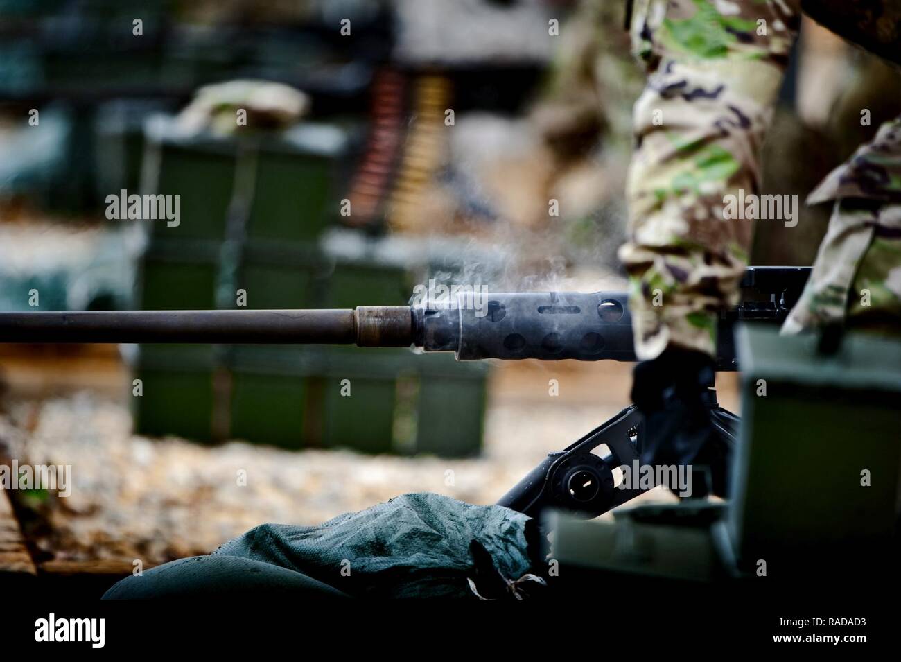 (FORT BENNING, GA) - Smoke billows from the barrel of the M2 Machine ...