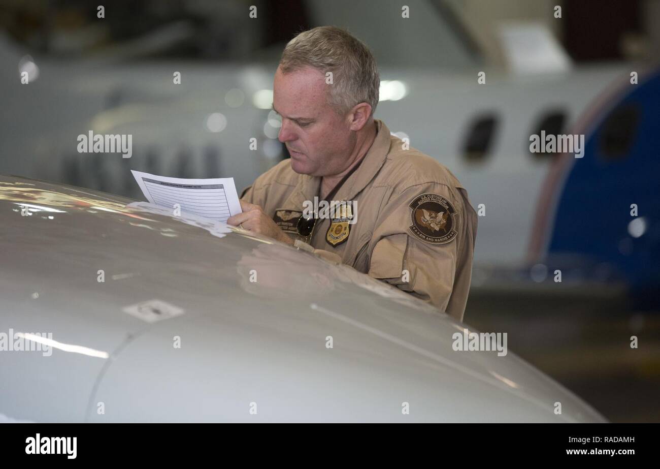 An air interdiction agent with the U.S. Customs and Border Protection ...