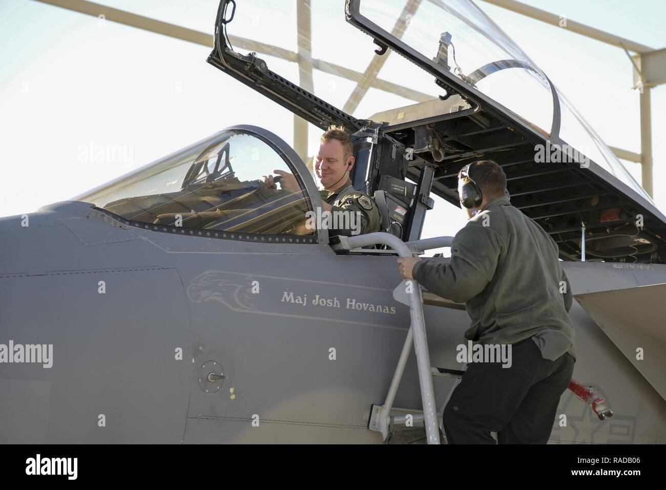 Maj. Cody Clark, 433rd Weapons Squadron F-15 pilot, is greeted by ...