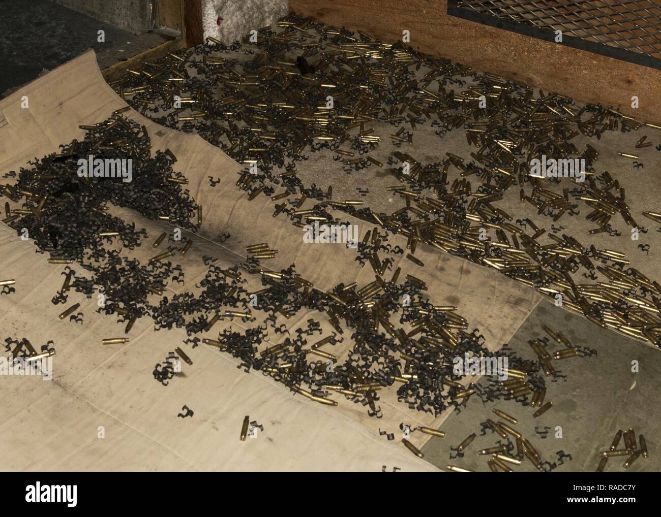 Empty cartridges litter the floor of the combat arms training and ...