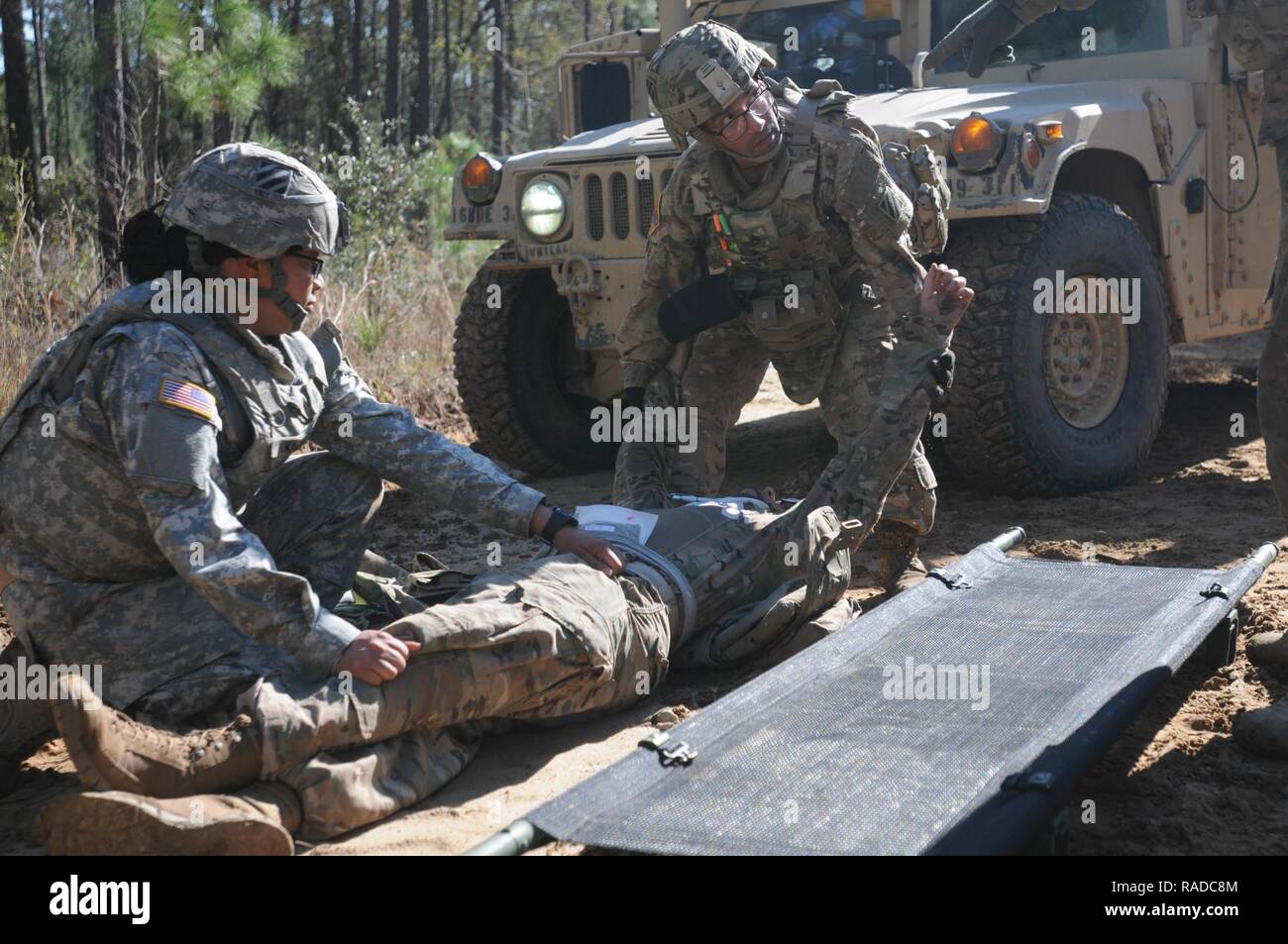 Spc. Cleneisha Knox (left) and Staff Sgt. Jayson Roman, both ...