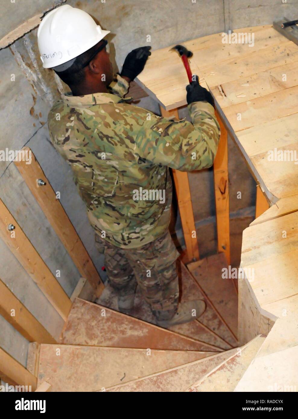 A carpentry and masonry specialist assigned to 1156th Engineer Company ...