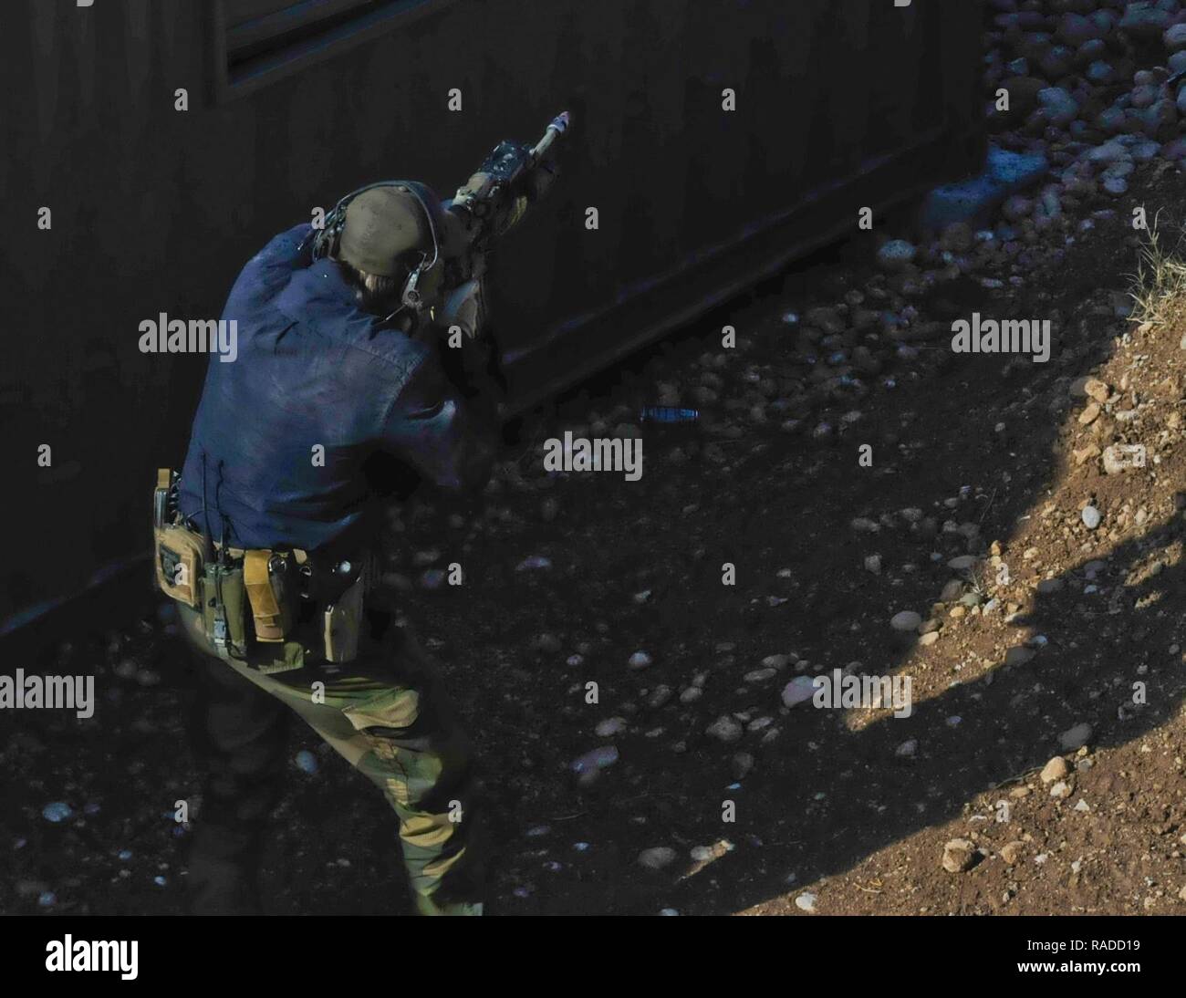 A Norwegian soldier acts as an enemy during urban operations training ...