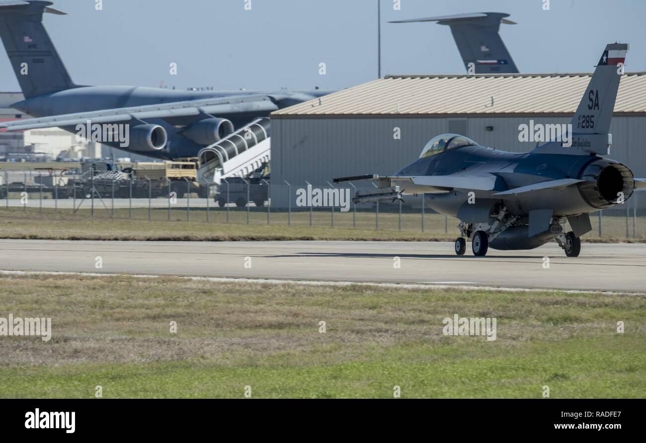 An F-16 Fighting Falcon assigned to the 149th Fighter Wing taxis down a ...