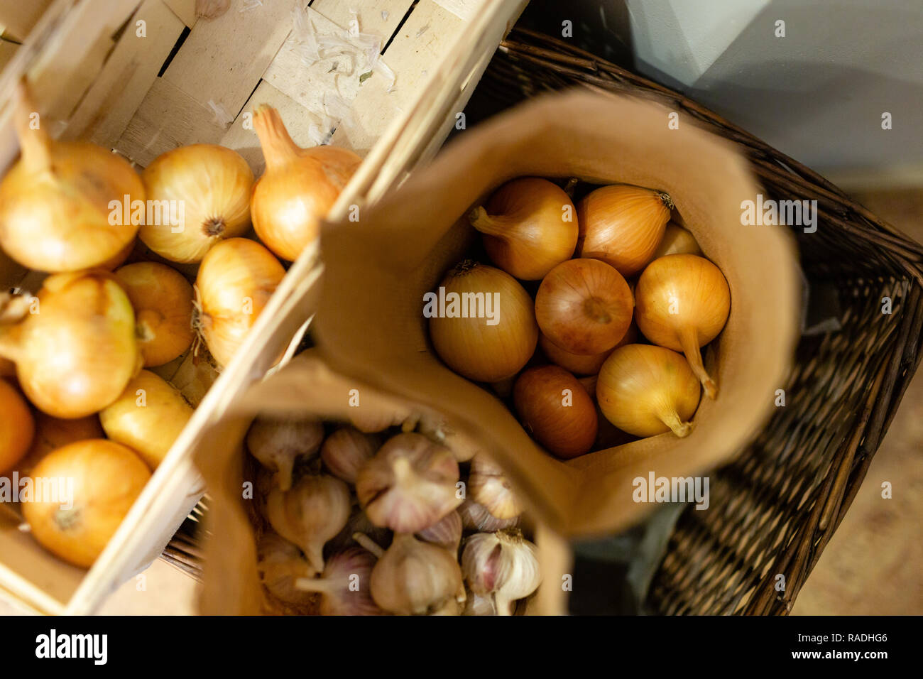 Natural fresh onions packed in paper bags. Top view image Stock Photo ...