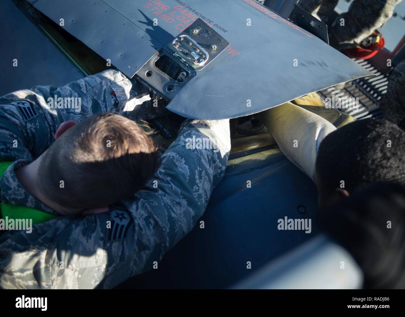 Staff Sgt. Michael Nichols, left and Airman 1st Class Christopher Jones ...