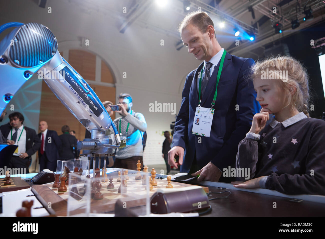 St. Petersburg, Russia - December 27, 2018: Robot playing chess with ...