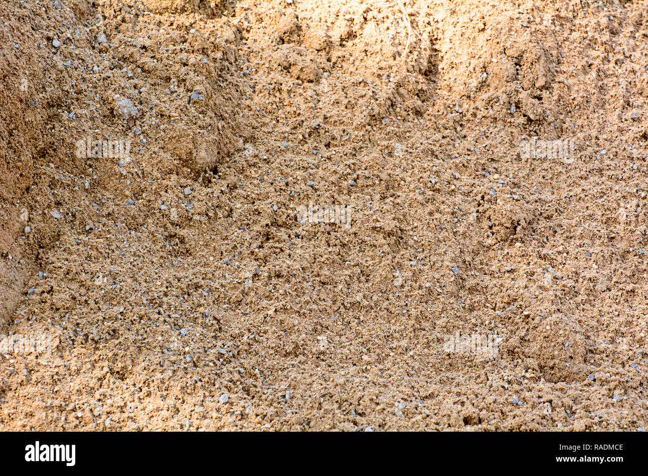 A pile of sand for construction and building Stock Photo - Alamy