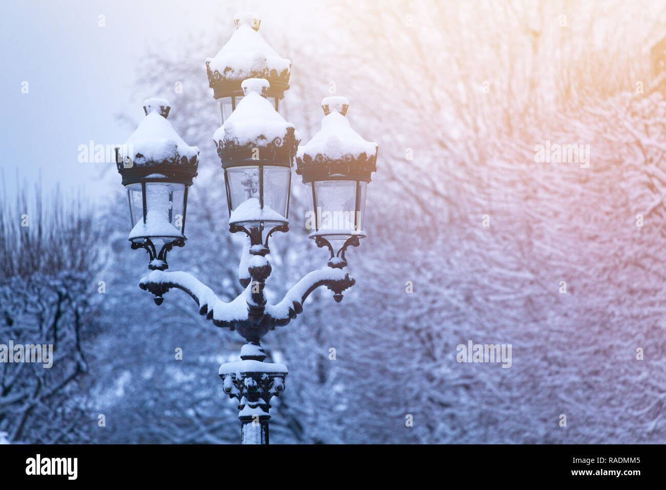 Winter landscape with lamp post under the snow Stock Photo - Alamy