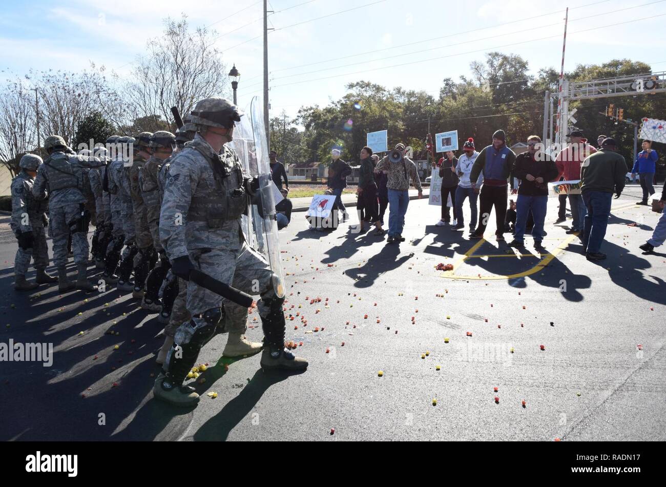 Members of the 81st Security Forces Squadron's riot control team hold ...