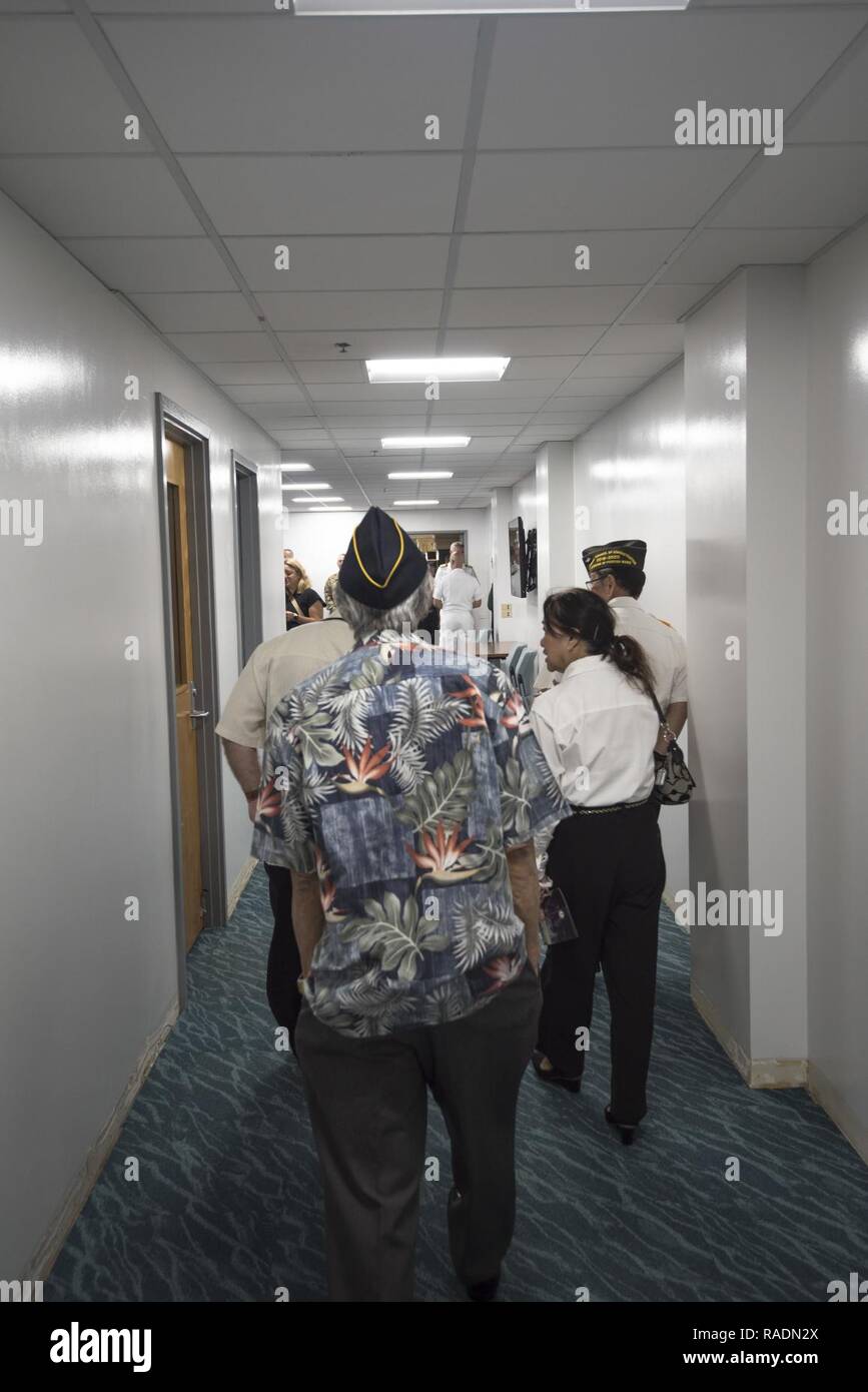 Visitors tour Building 220 during a re-dedication ceremony at Joint ...