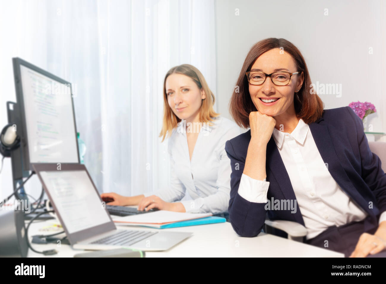 Assistant sitting hi-res stock photography and images - Alamy