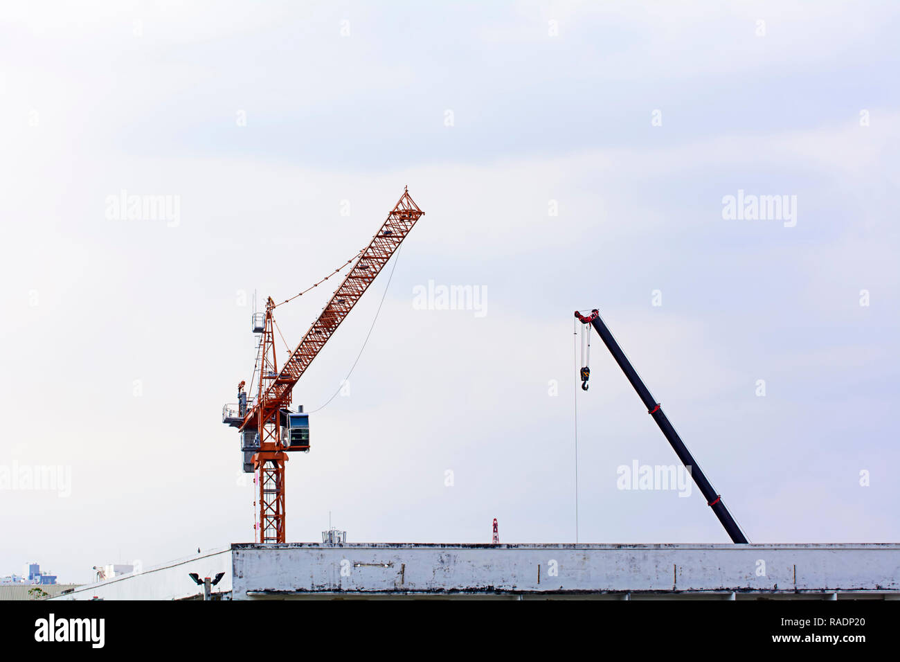 Tower crane is the critical equipment in construction Stock Photo - Alamy