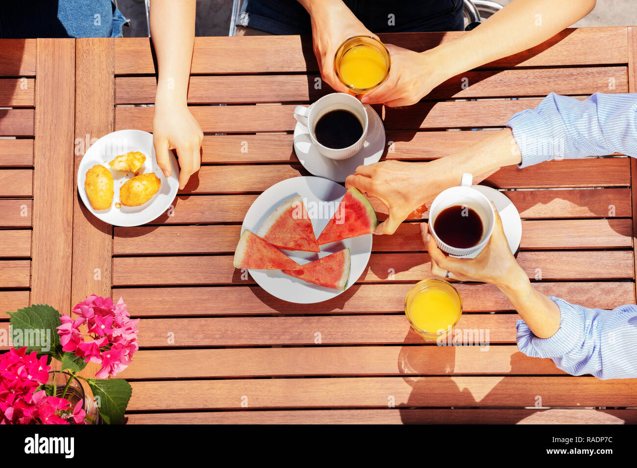 Woman having healthy breakfast outside hi-res stock photography and ...