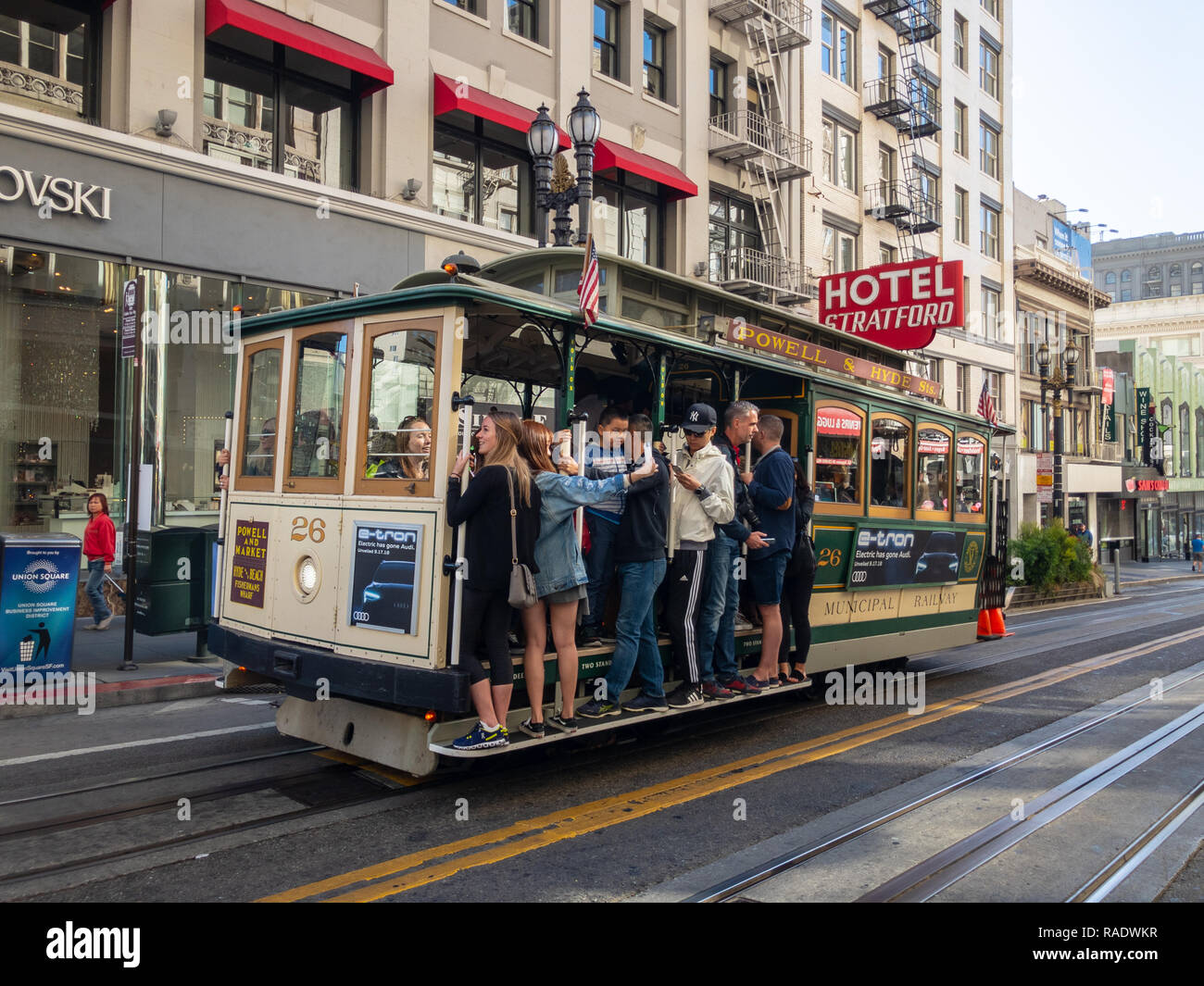 Tourists riding old tram at day time Stock Photo - Alamy