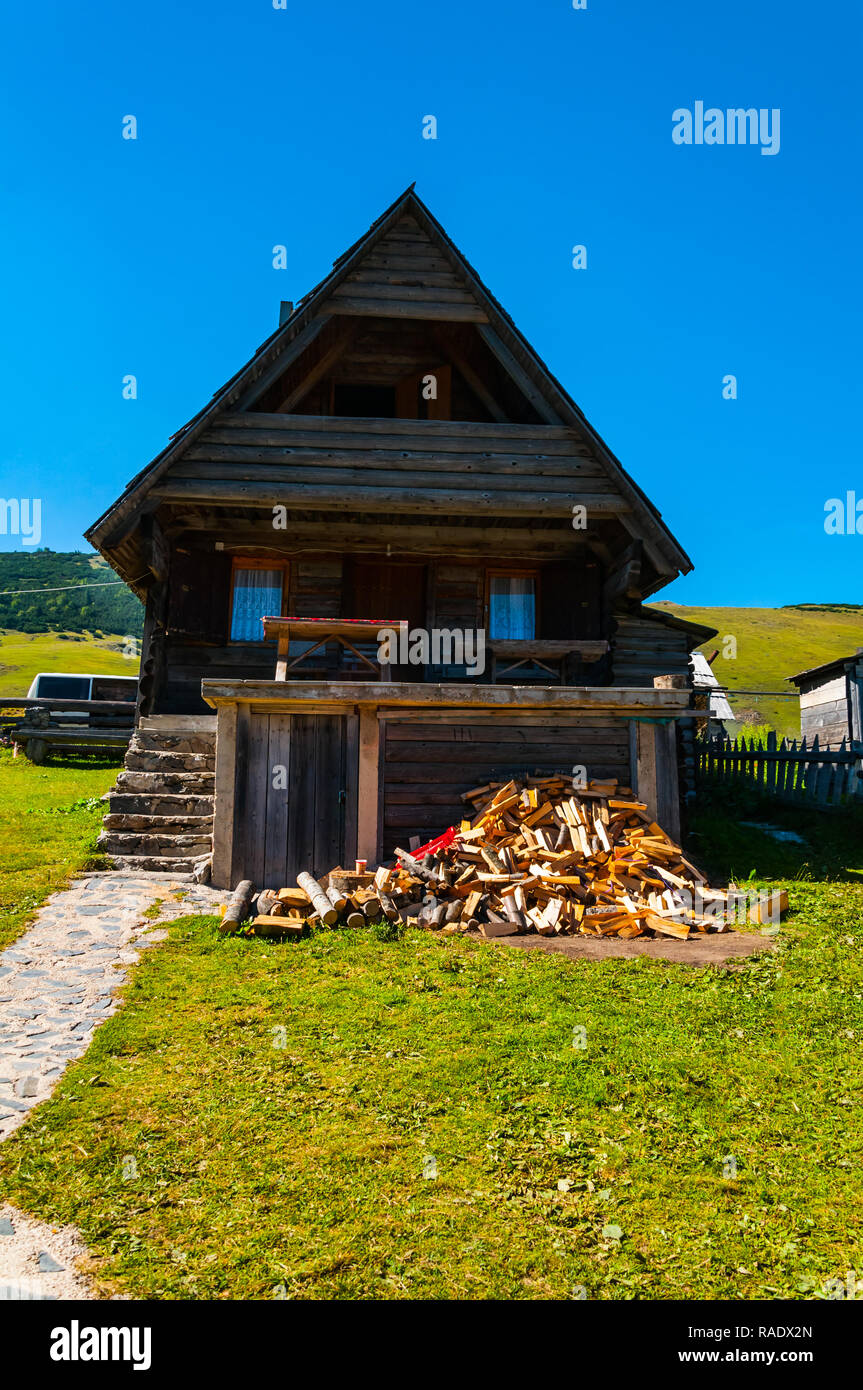The small wooden house on the mountain Vranica in Bosnia Stock Photo ...