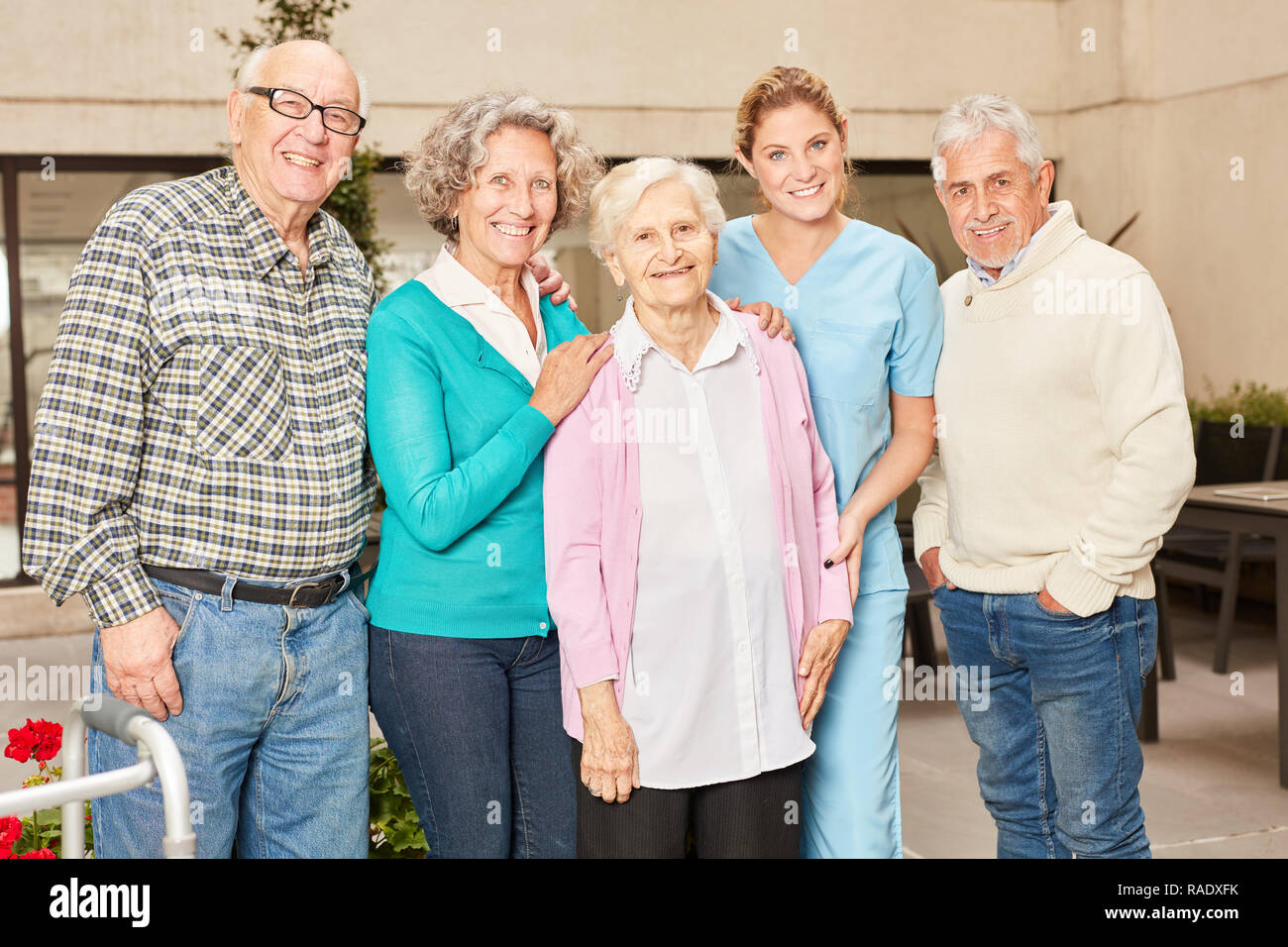 Group of happy seniors together in retirement home or retirement home ...