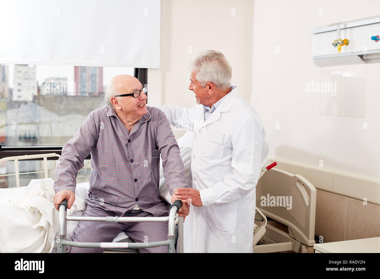 Sick old man walking walker hi-res stock photography and images - Alamy