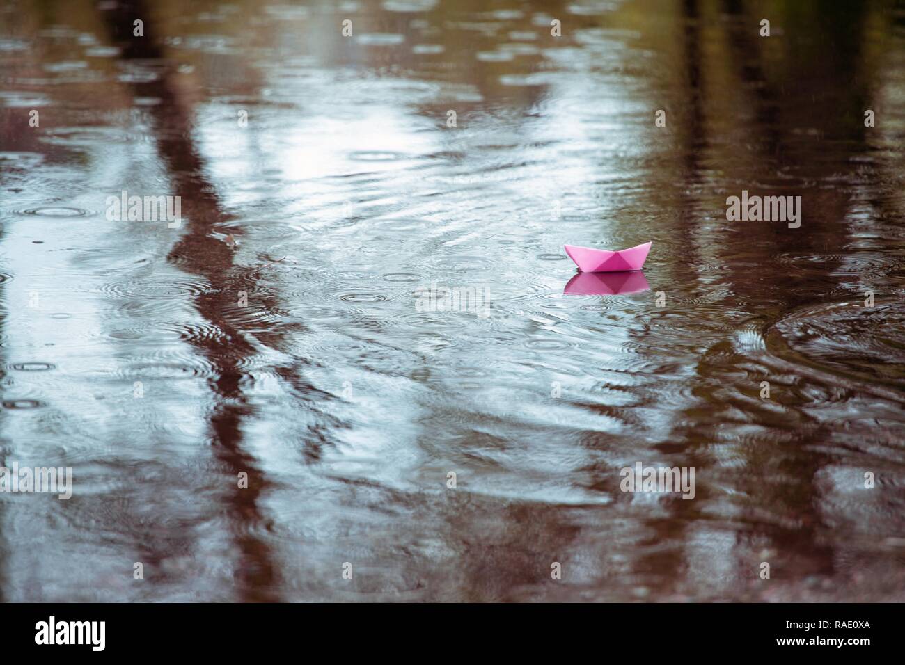 Puddle boat toy hi-res stock photography and images - Alamy