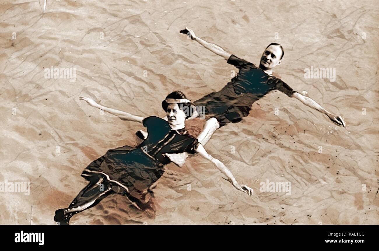 Man and woman floating on their backs in water, Couples, Swimming, 190 ...