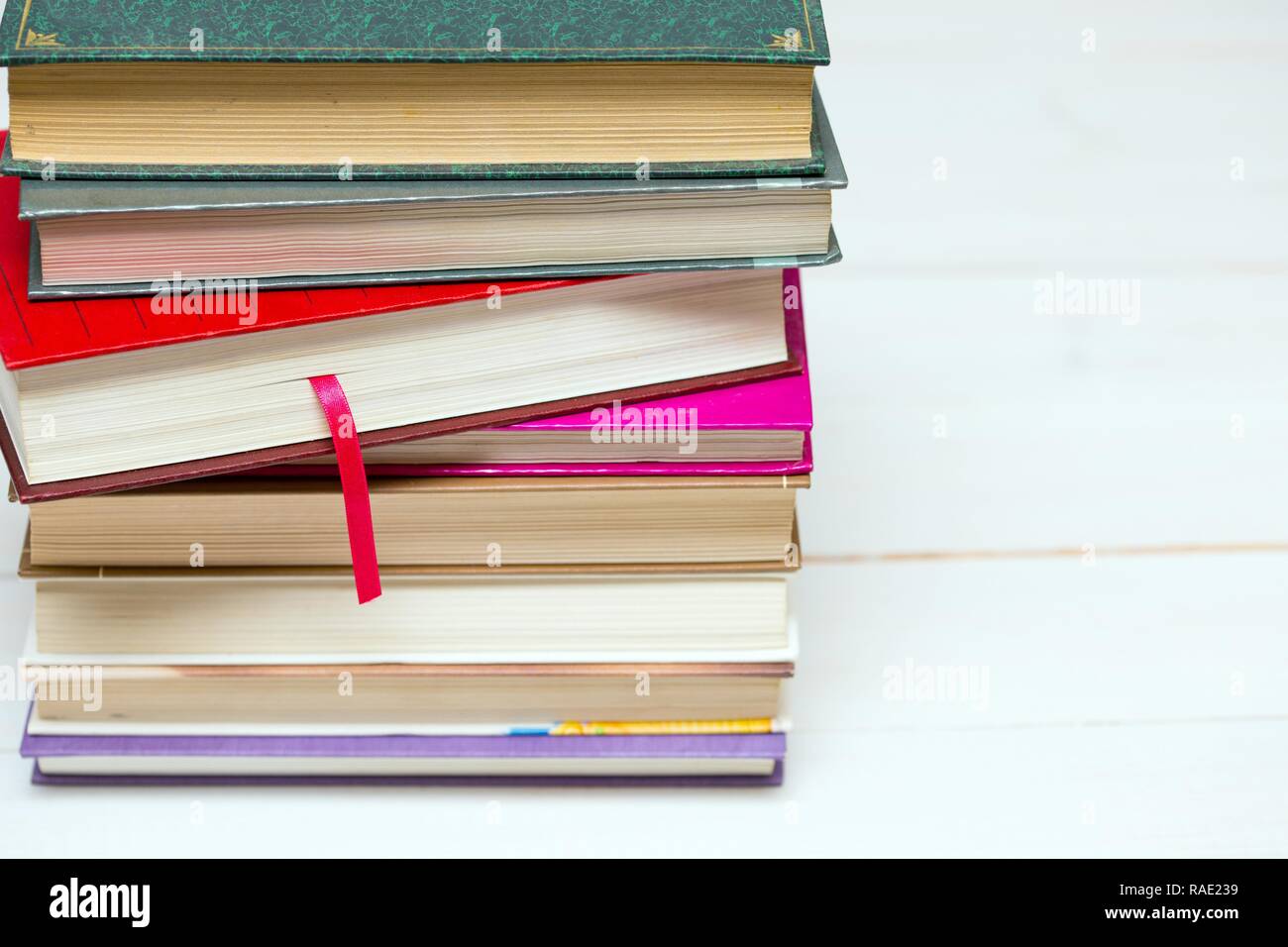 Stack of books on a white background hi-res stock photography and ...