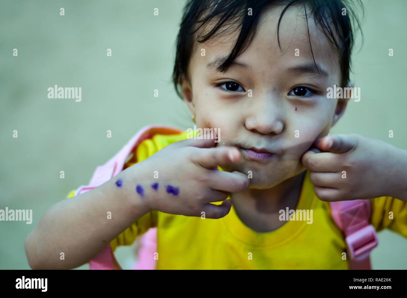 Tibetan faces hi-res stock photography and images - Alamy