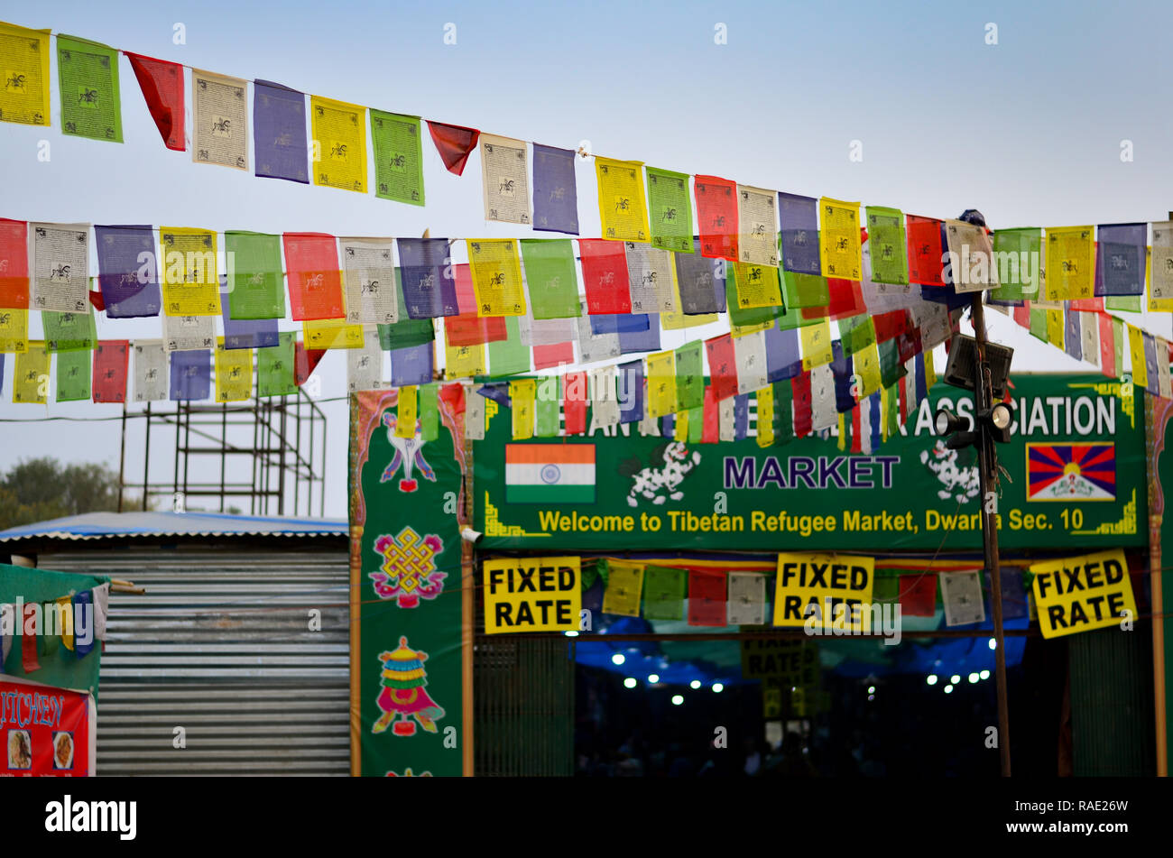 Tibetan refugee market entry decorated with Buddhist flags in Delhi ...