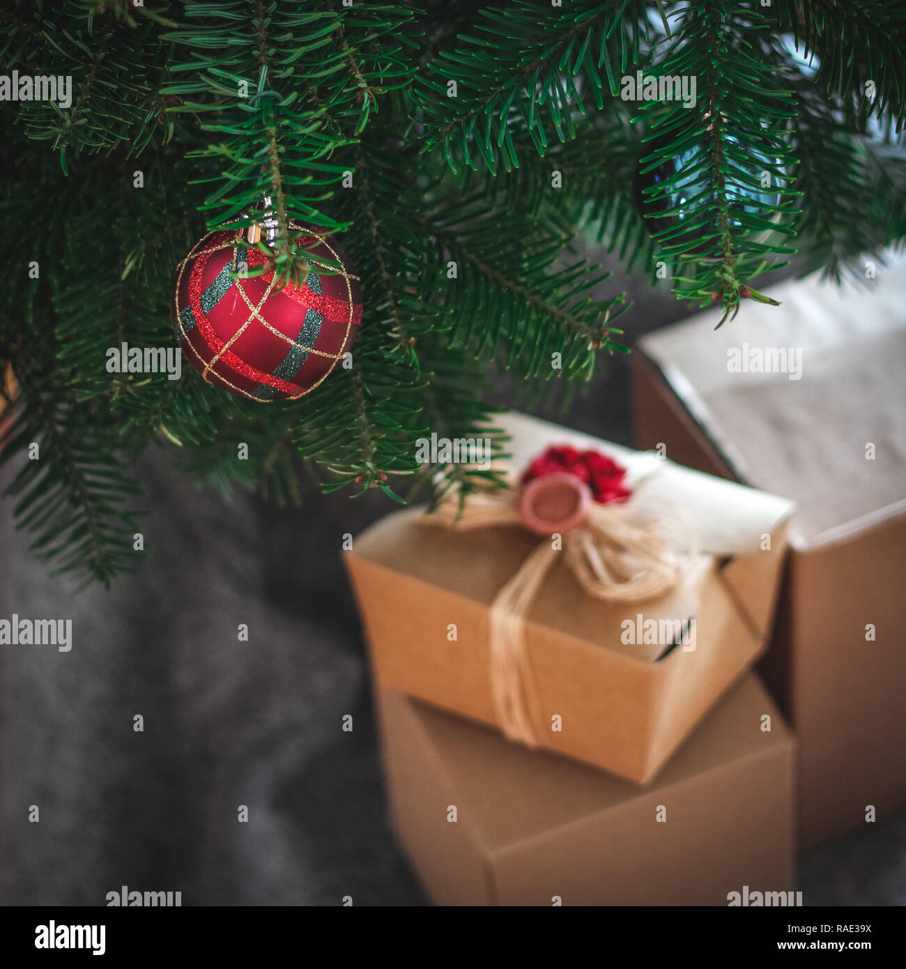 Christmas gifts under the Christmas tree Stock Photo - Alamy