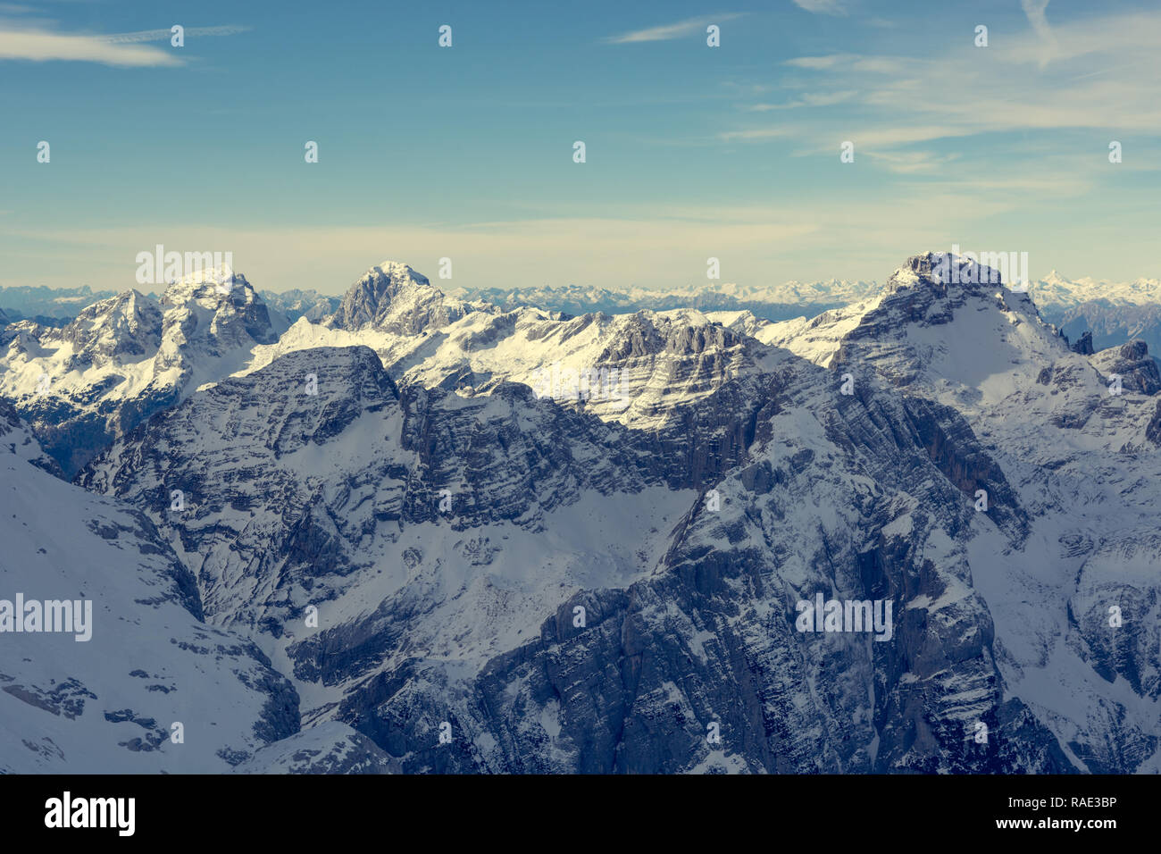 Spectacular winter mountain panorama with peaks covered with early snow ...