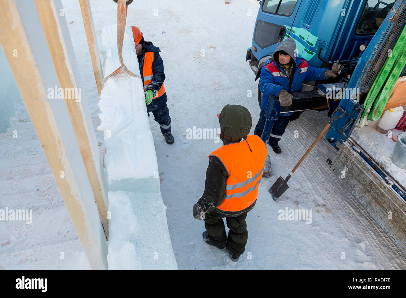 Installers are building an ice town of ice blocks Stock Photo - Alamy
