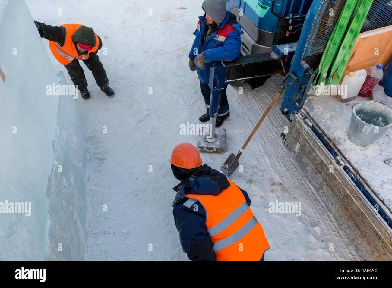 Installers are building an ice town of ice blocks Stock Photo - Alamy