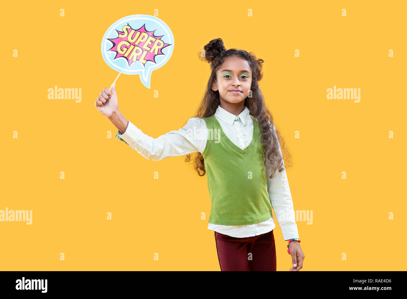 Nice pretty girl holding a painted sign Stock Photo - Alamy