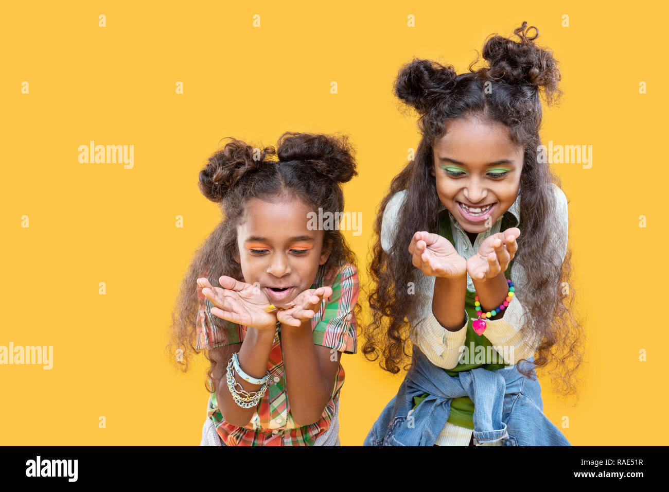 Nice happy cute sisters having fun together Stock Photo - Alamy