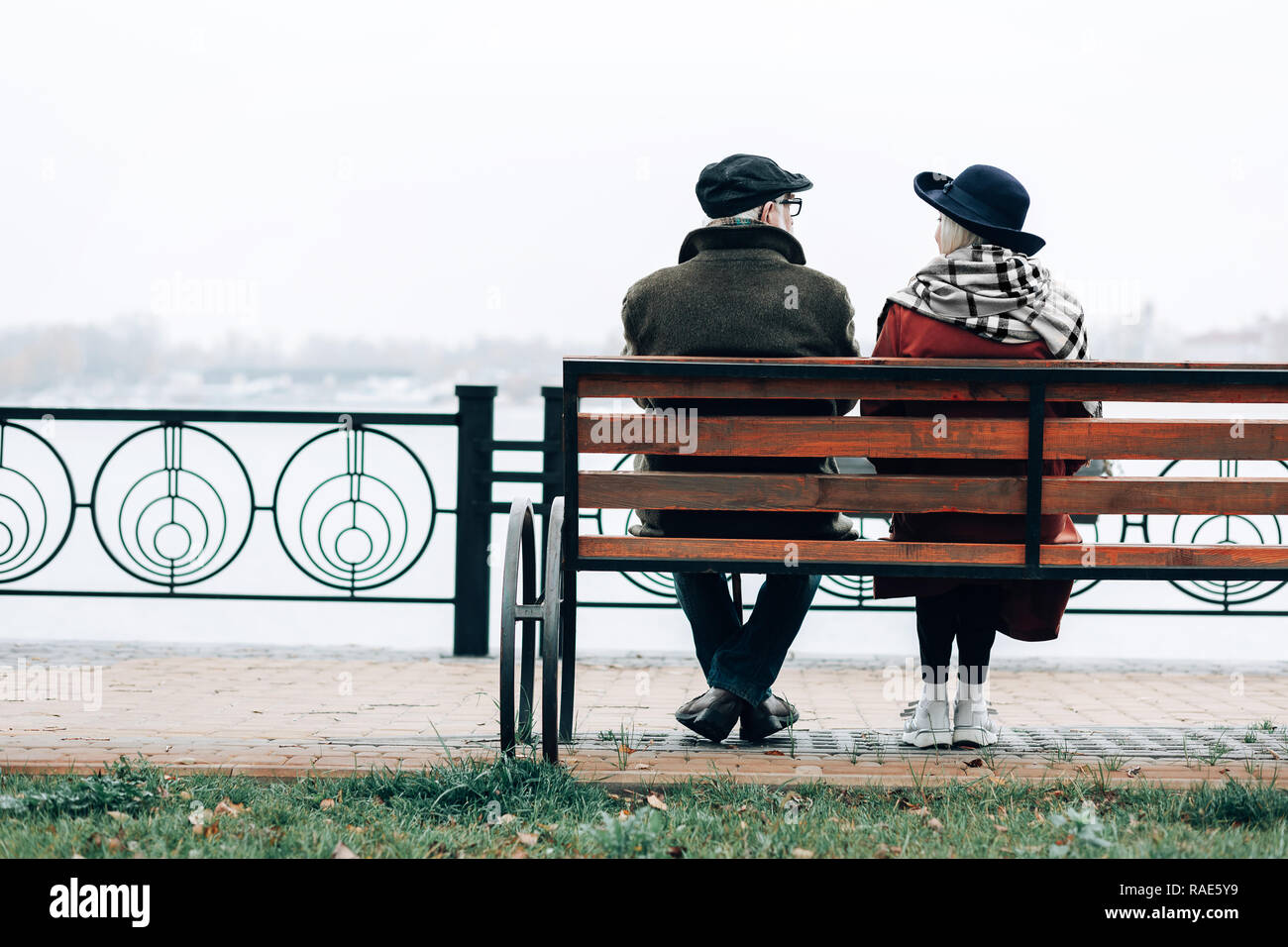 Pleased blonde female having friendly conversation with partner Stock ...