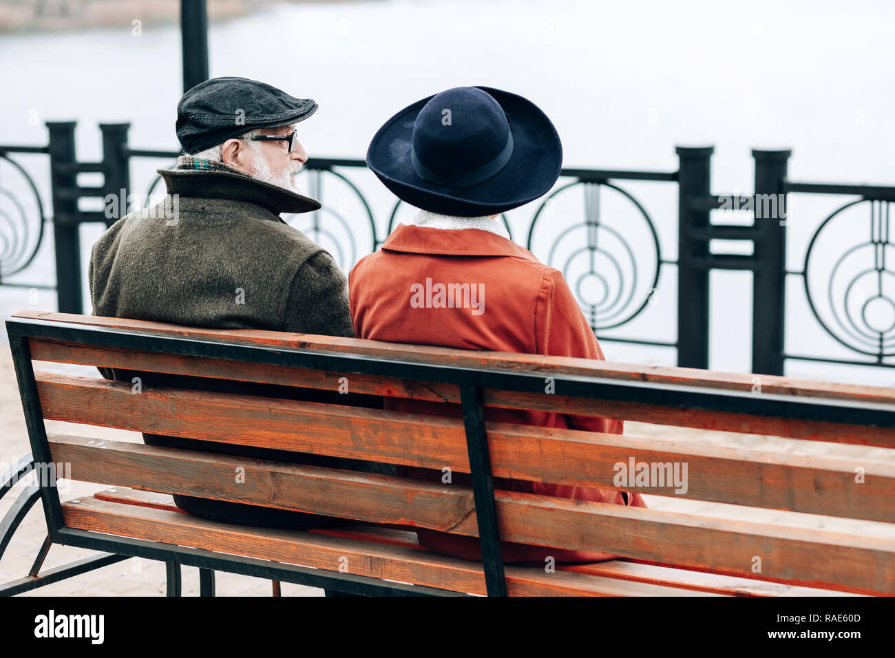 Mature people enjoying rest in park together Stock Photo - Alamy