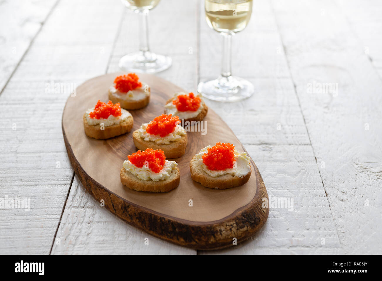 Canapes - crostini with labneh and seaweed pearls Stock Photo - Alamy