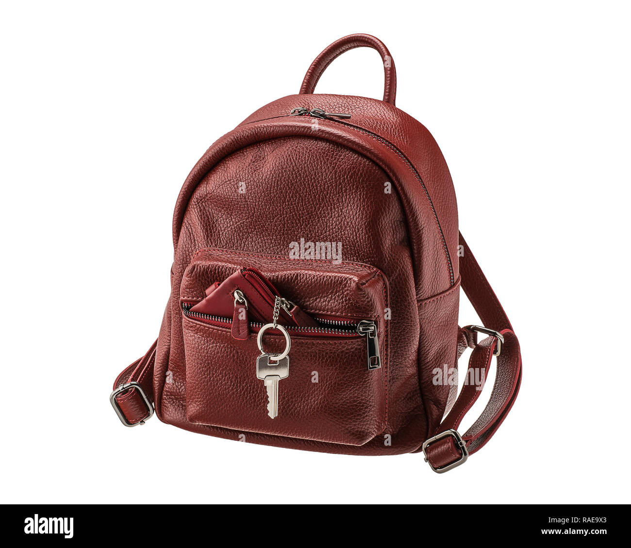 Dark red leather women's backpack with key and wallet isolated on white ...