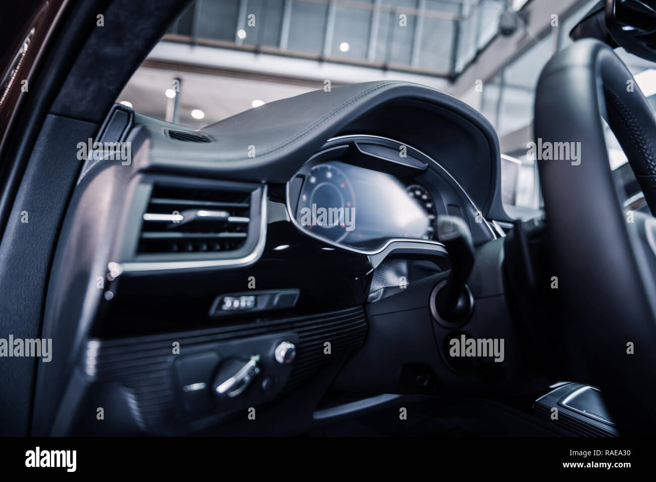 Close up of wheel inside new modern car with leather interior Stock ...