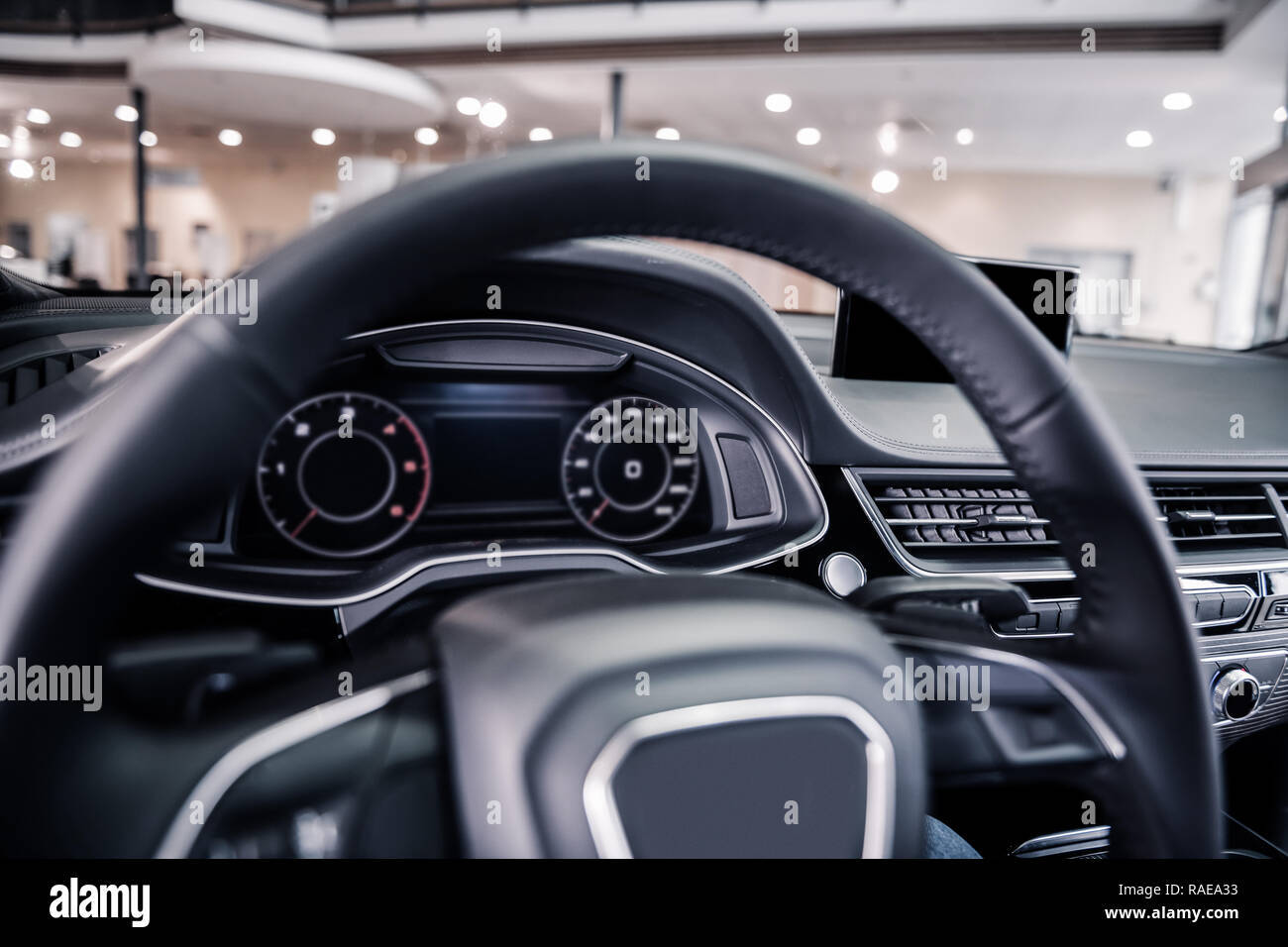 Close up of wheel and speed monitor inside the car Stock Photo - Alamy
