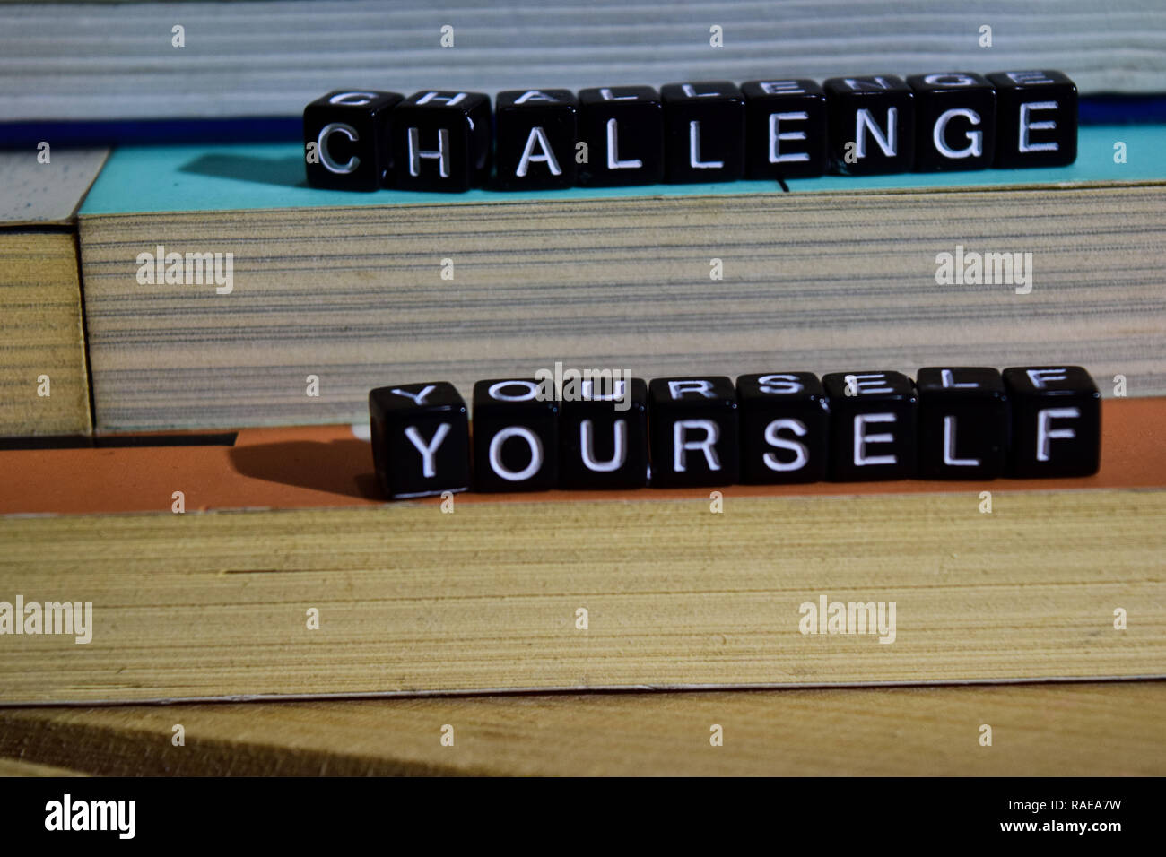 Challenge yourself on wooden blocks. Motivation and inspiration concept ...